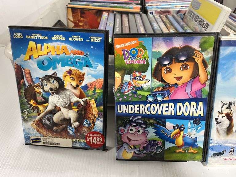 (50) DVDs in cases, include: Kids and PG movies; (64) Movies in book ...
