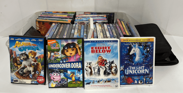 (50) DVDs in cases, include: Kids and PG movies; (64) Movies in book ...