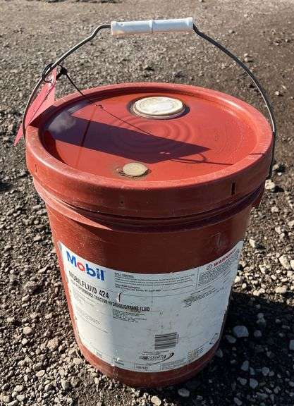 Nearly full 5-gallon bucket of mobil 424 hydraulic/tractor fluid ...
