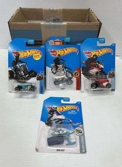 (12) Hot Wheels/Matchbox motorcycles, ATVs, snowmobiles, in original ...
