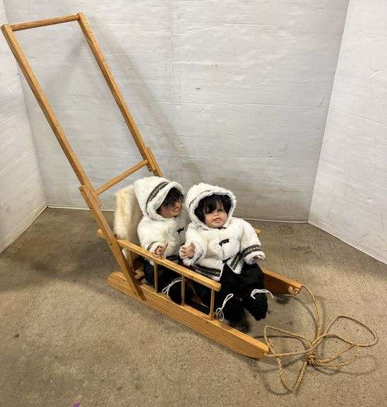 Homemade wooden sled with (2) Eskimo babies dressed in matching sherpa ...