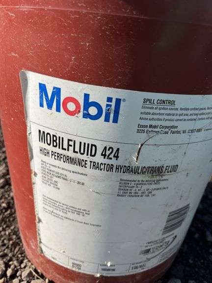 Nearly full 5-gallon bucket of mobil 424 hydraulic/tractor fluid ...