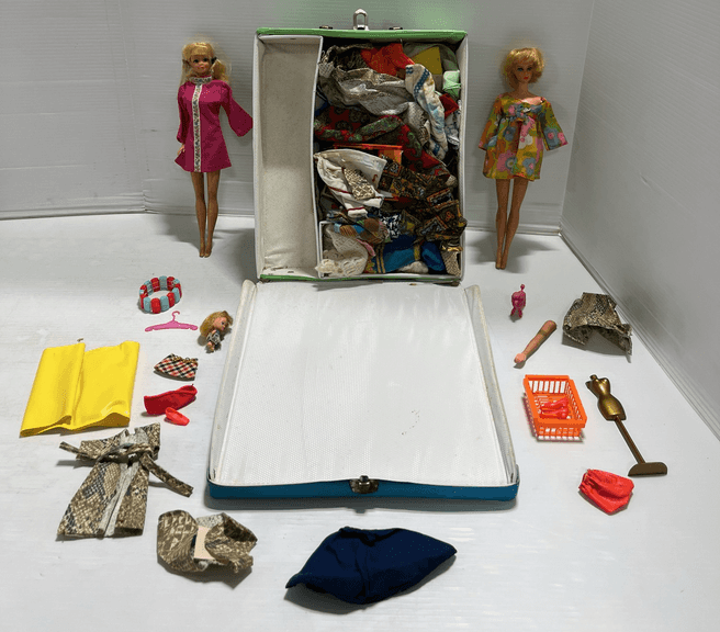 Older Barbies, case, and clothes, case- 12"H, used, both Barbies are ...