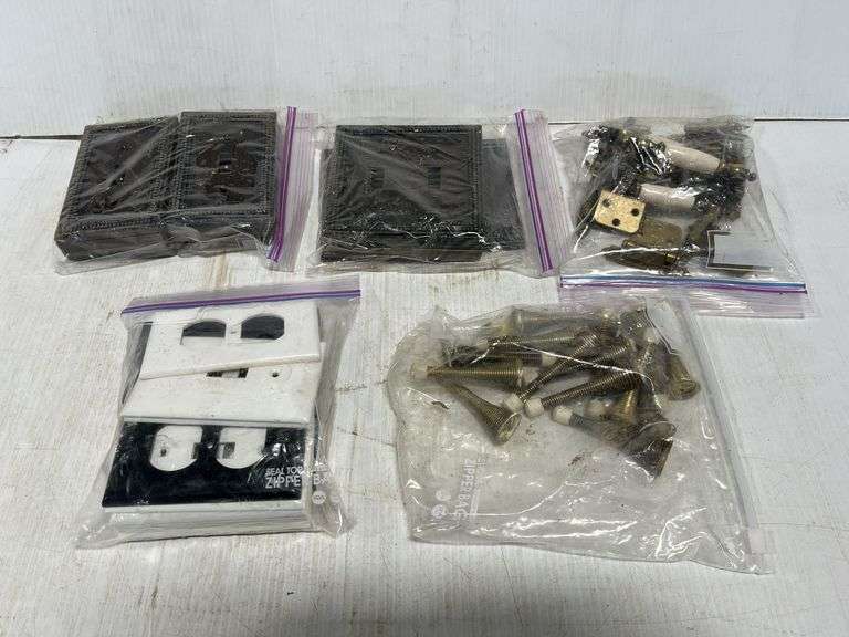 Door stoppers, light and electrical plates, and handles and hinges ...