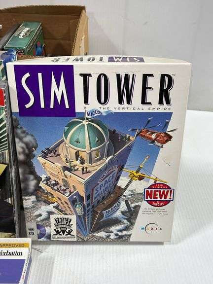 Older computer games, with SIM tower, SIMCity 3000, Myst, Resume Deluxe ...