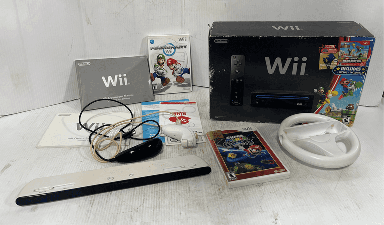 Nintendo Wii items, includes: (2) Operation manuals, (5) Different ...