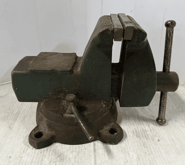 Vise marked 111056, 4" jaws, anvil work arca, swivel base, needs ...