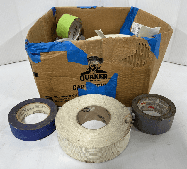 Box of partially used rolls of tape - Albrecht Auction Service