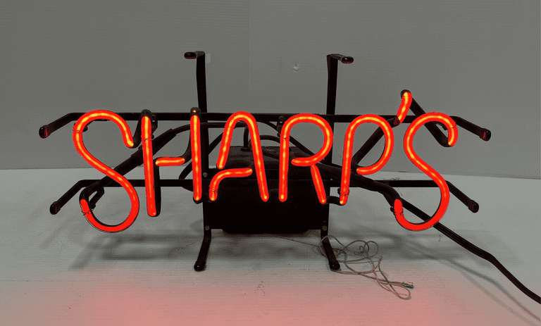 Older red neon "Sharp's" beer sign, original bright red lettering looks ...