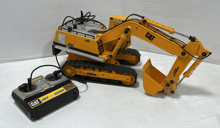 Caterpillar Excavator with remote control, 1988, approx. 21"L ...