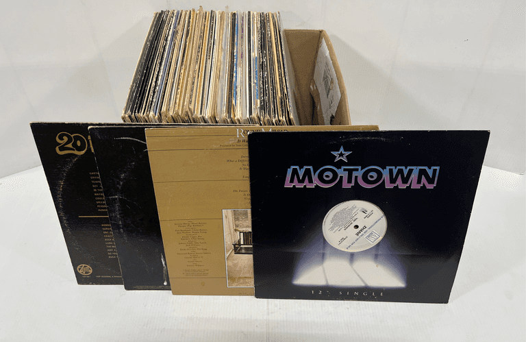 Over (60) records - Albrecht Auction Service
