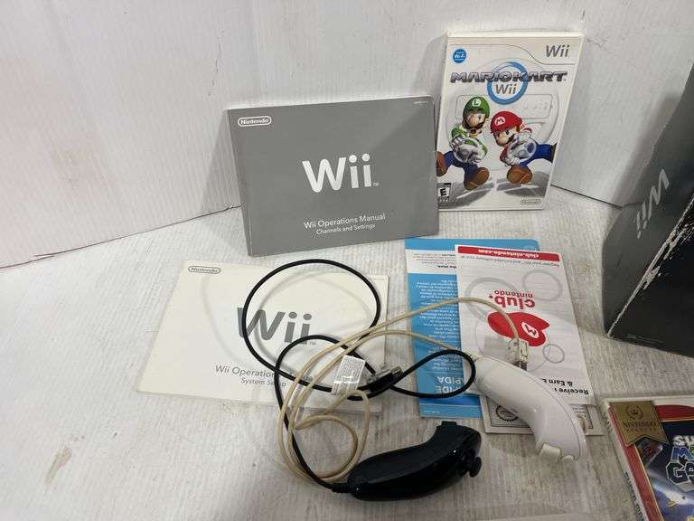 Nintendo Wii items, includes: (2) Operation manuals, (5) Different ...