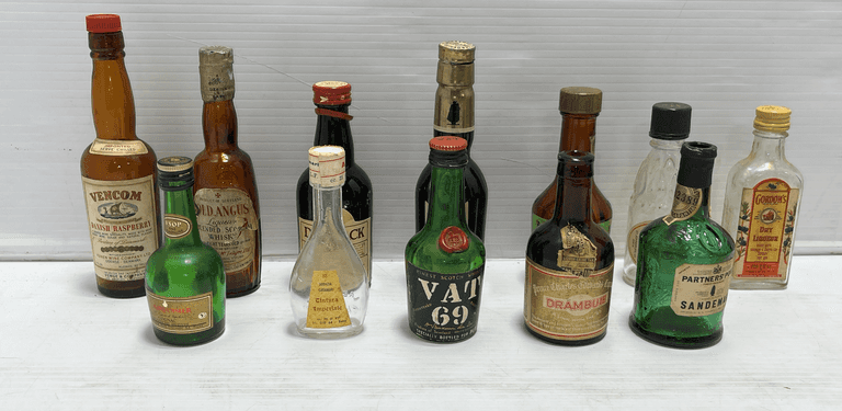 (12) Different liquor sample bottles, all with labels and caps, up to 5 ...