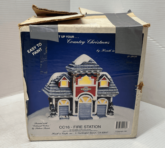 Country Christmas fire station, box- 9 1/2"H - Albrecht Auction Service