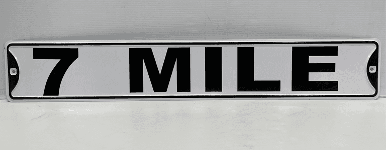Porcelain metal "7-Mile" Sign - Albrecht Auction Service