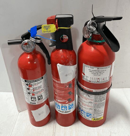 8 lb. and (2) 3 lbs. Fire extinguishers, all full and gauges in green ...