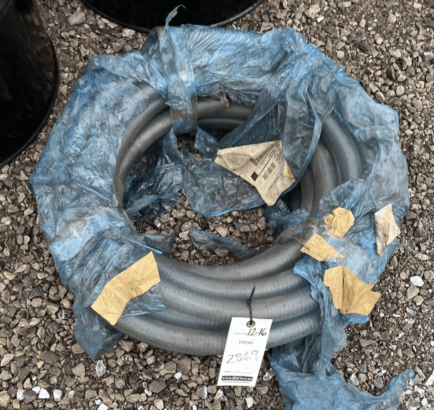 Roll of 1 1/4" Plastic tubing, 100', new - Albrecht Auction Service