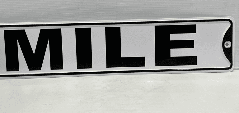Porcelain metal "7-Mile" Sign - Albrecht Auction Service