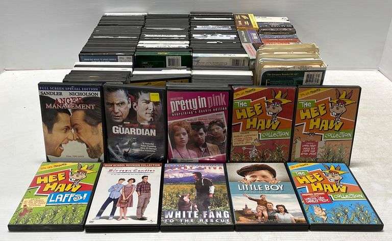 (100) DVDs, and (21) VHS movies: 4- Walt Disney - Albrecht Auction Service