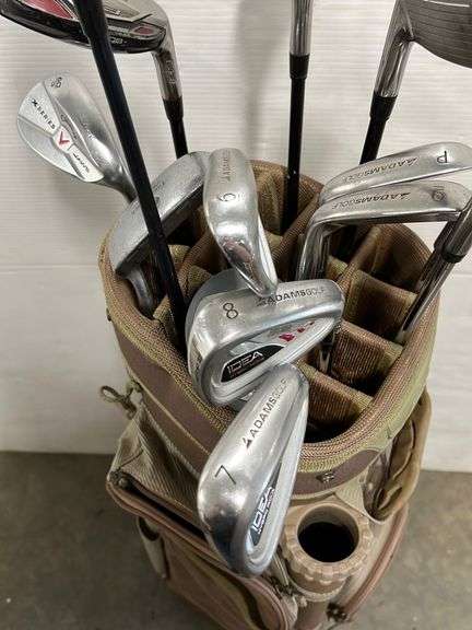 Adams golf set of irons and (3) hybrid woods with golf bag, 34"H, good ...