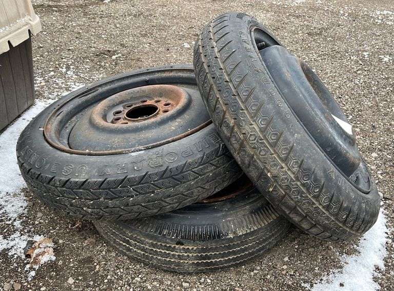 (2) Donut tires on rims, 5-hole and 10-hole; Misc. tire on 4-hole rim ...