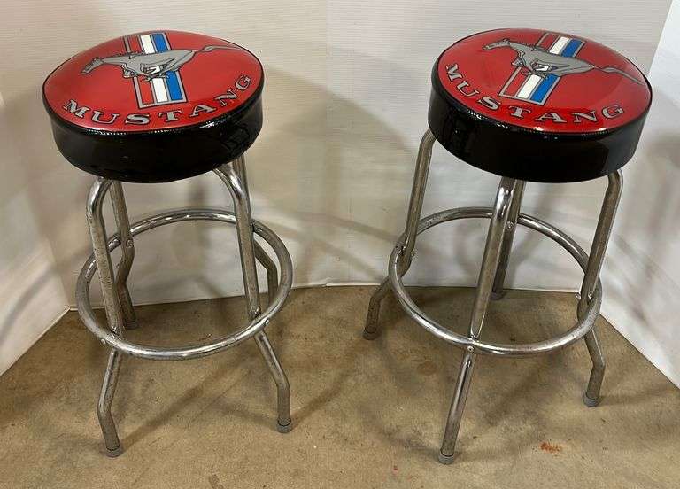 (2) Ford Mustang swiveling bar stools, 14"Dia x 29"H, has a little ...