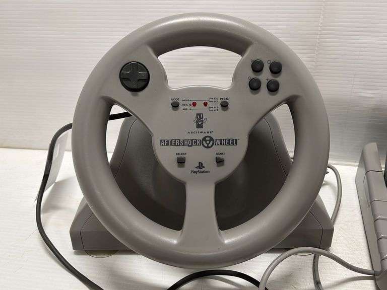 Playstation steering wheel controller wiht pedals, some GameBoy games ...