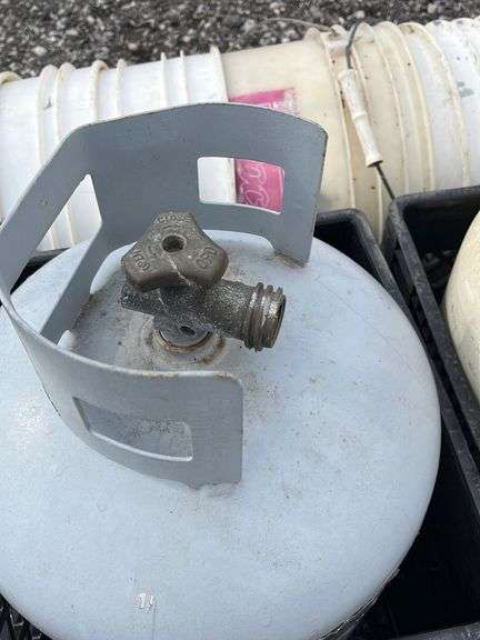 (2) Propane tanks, new style valves, one is full, one is a quarter full ...