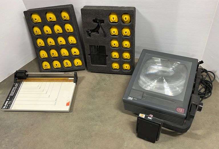 Overhead projector, letter stamps, and paper cutter, all work ...