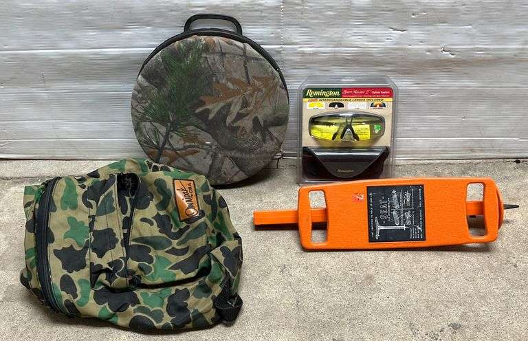 Box of hunting items, includes: Remington-shooting glasses, NIB ...