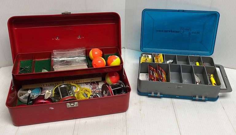 Red tackle box with assorted equipment, Blue box with lure, Yellow and ...