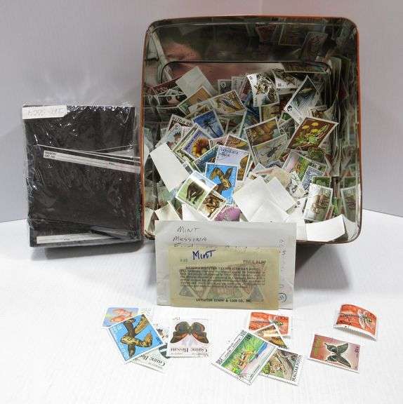 Stamps of the World Collection in tin, Stamp archival cards, and mint ...