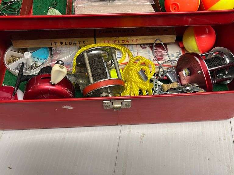 Red tackle box with assorted equipment, Blue box with lure, Yellow and ...
