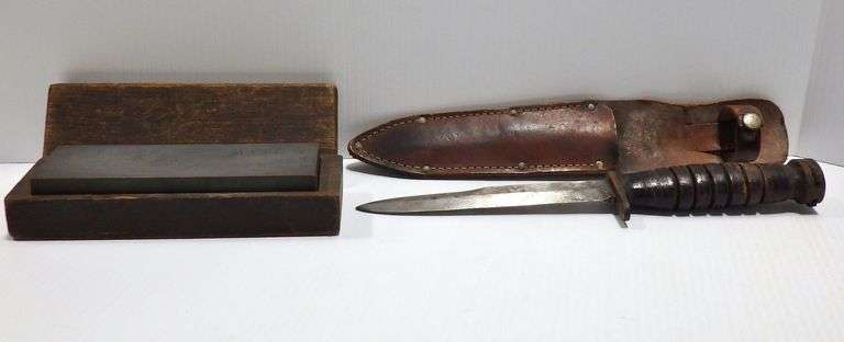 Bayonet with leather handle and sheath, locking spring still intact ...