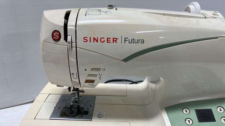 Singer/Futura sewing/embroidery machine, instructions included ...