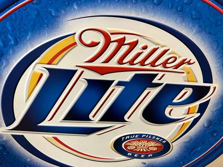 Miller Lite tin sign, 32"W x 25"H - Albrecht Auction Service