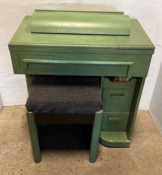 Singer 306K sewing machine in cabinet with chair full of sewing items ...