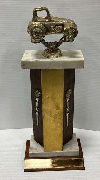 Vintage 1960s race car trophy metal race car on tip, wood and marble ...