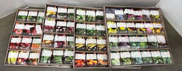 Bentley seed rack full of vegetable and flower seed packs, expired but ...