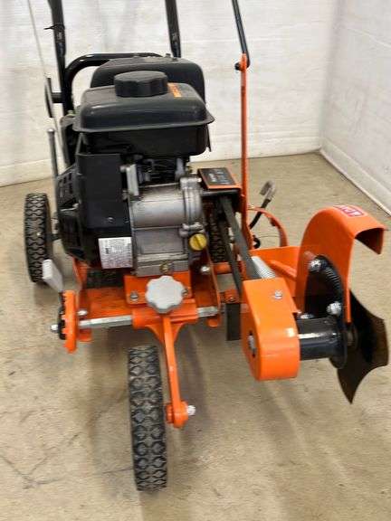 Powermate lawn edger, works great - Albrecht Auction Service