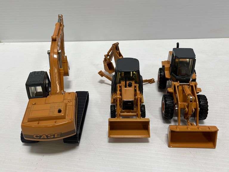 (3) Case ERTL toys, includes: One- 621-B Wheel Loader; One- 590 Super-L ...