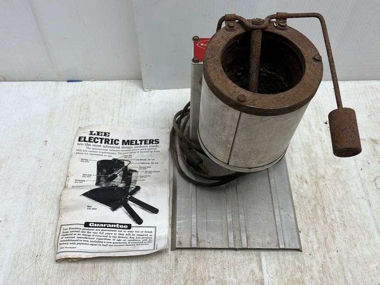 Lee electric melter with manual, 9"H - Albrecht Auction Service