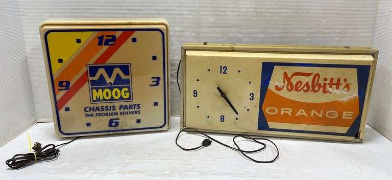 (2) Old store clocks, includes: 1- MOOG, and 1- Nesbitts, up to 24"W x ...
