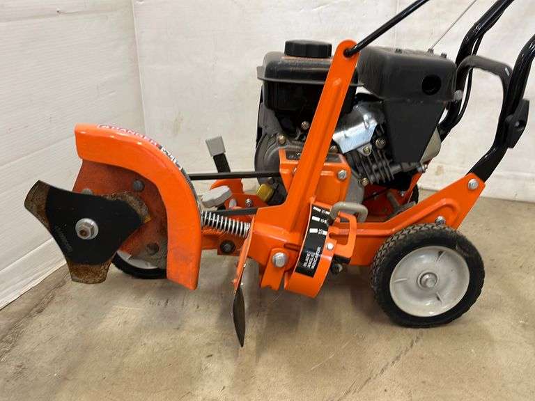 Powermate lawn edger, works great - Albrecht Auction Service