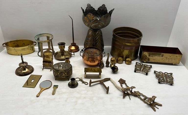 (35) Pieces of assorted brass items, includes: Plant holders, napkin ...
