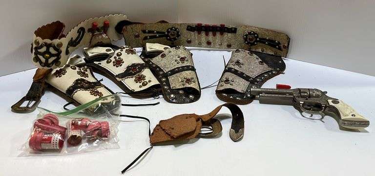 (2) Sets of Texas Jr. cap guns with belts, holsters, and caps ...