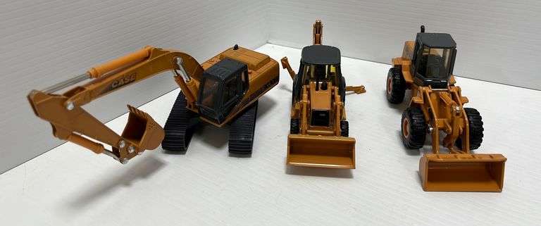 (3) Case ERTL toys, includes: One- 621-B Wheel Loader; One- 590 Super-L ...