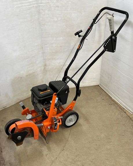 Powermate lawn edger, works great - Albrecht Auction Service