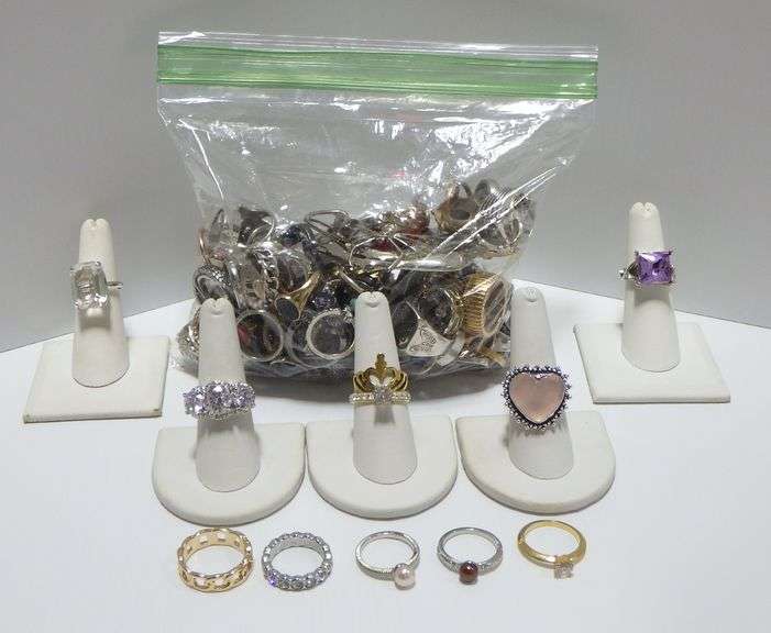 Over (100) rings, various sizes and styles, all untested, some may show ...
