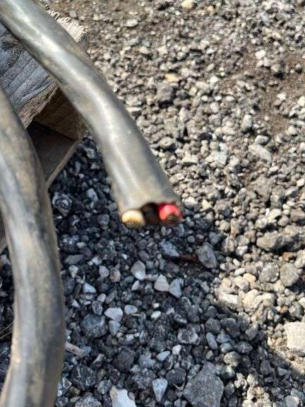 One piece of heavy copper wire, approx. 250' maybe No. 6; One piece of ...